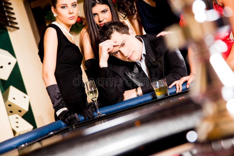 Young People Behind Roulette Table Stock Photo - Image of roulette ...