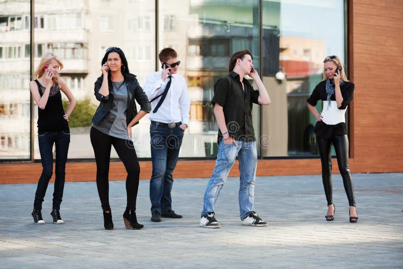 Young People Calling on the Cell Phones Stock Image - Image of college ...
