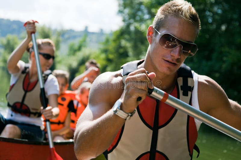 Young People Canoeing stock image. Image of daughter - 84340363