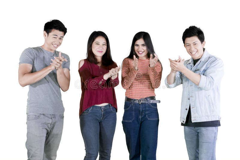 Young People Clap Their Hands Together on Studio Stock Photo - Image of ...
