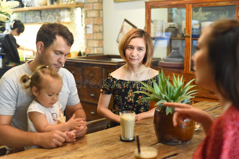 Young People Communicate with Each Other in Cafe Stock Photo - Image of ...
