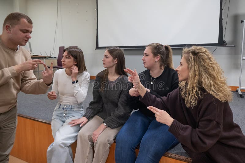 Young People Communicate in Sign Language in a University Classroom ...