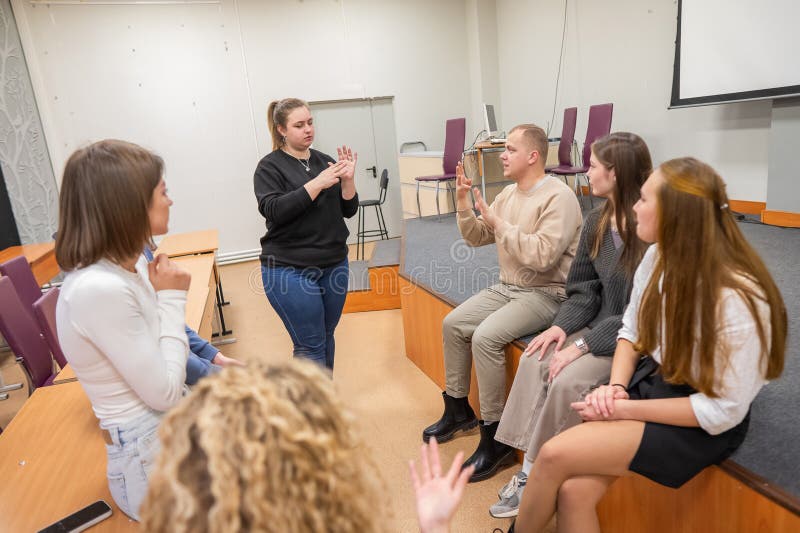Young People Communicate in Sign Language in a University Classroom ...
