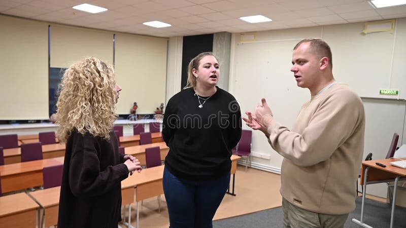Young People Communicate in Sign Language in a University Classroom ...