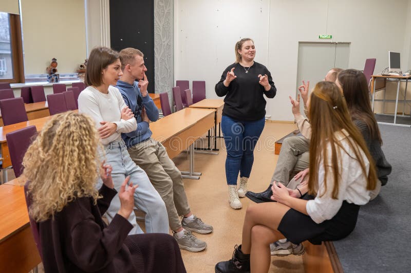 Young People Communicate in Sign Language in a University Classroom ...