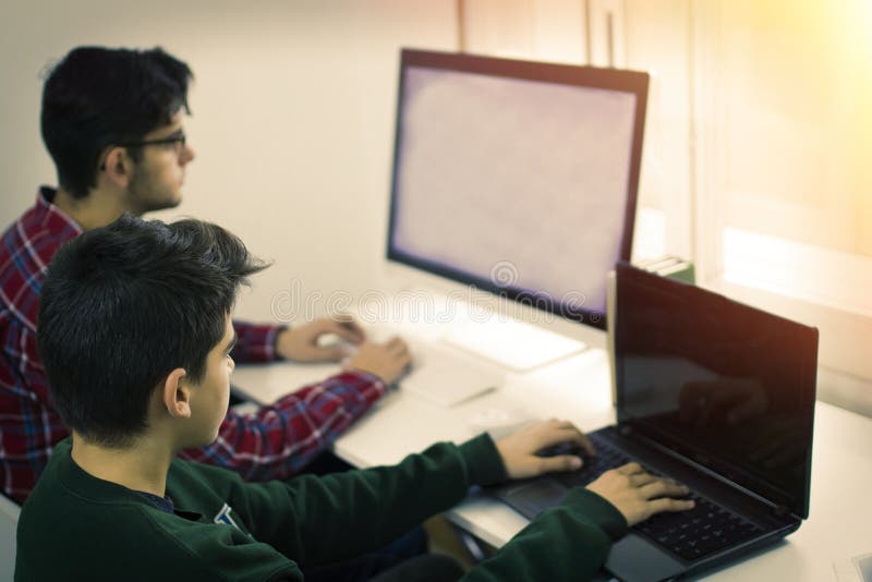 Young People with the Computer Stock Image - Image of people, interior ...