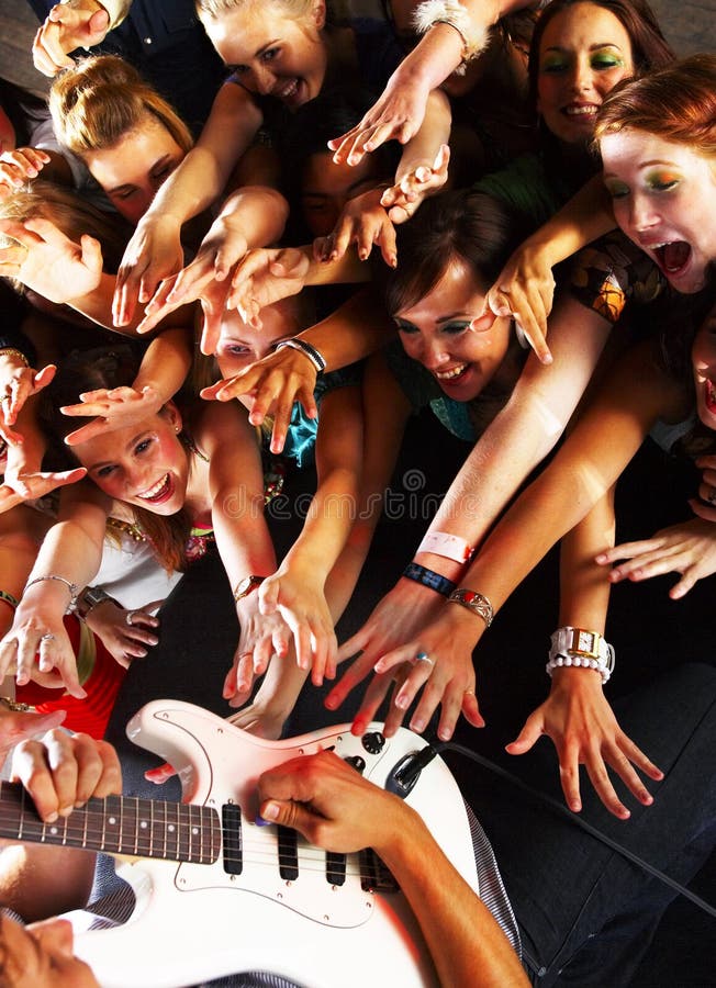 Young people at a concert. stock photo. Image of faces - 3184758