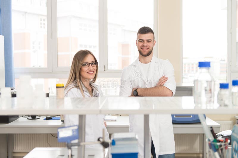 Young People Couple in Bright Modern Lab Stock Photo - Image of ...
