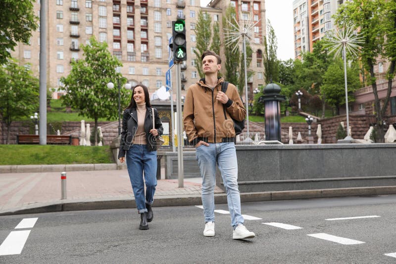 Young People Crossing Street at Traffic Lights Stock Photo - Image of ...