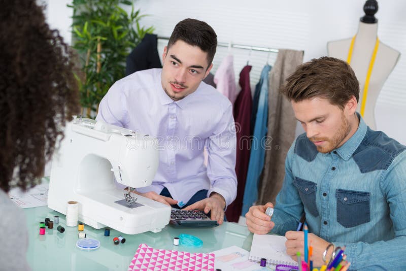 Young People Doing Craft Project with Sewing Machine Stock Photo ...