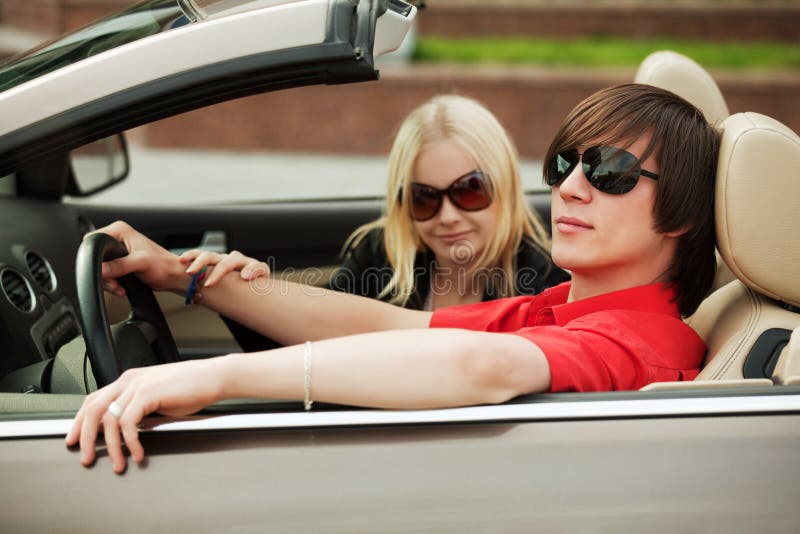 Young people driving a car stock image. Image of happy - 30973663