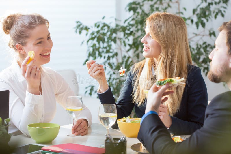 Young People Eating Lunch in Office Stock Image - Image of professional ...