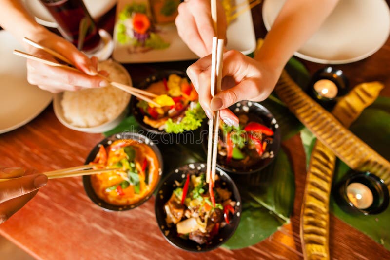 Young People Eating in Thai Restaurant Stock Photo - Image of closeup ...