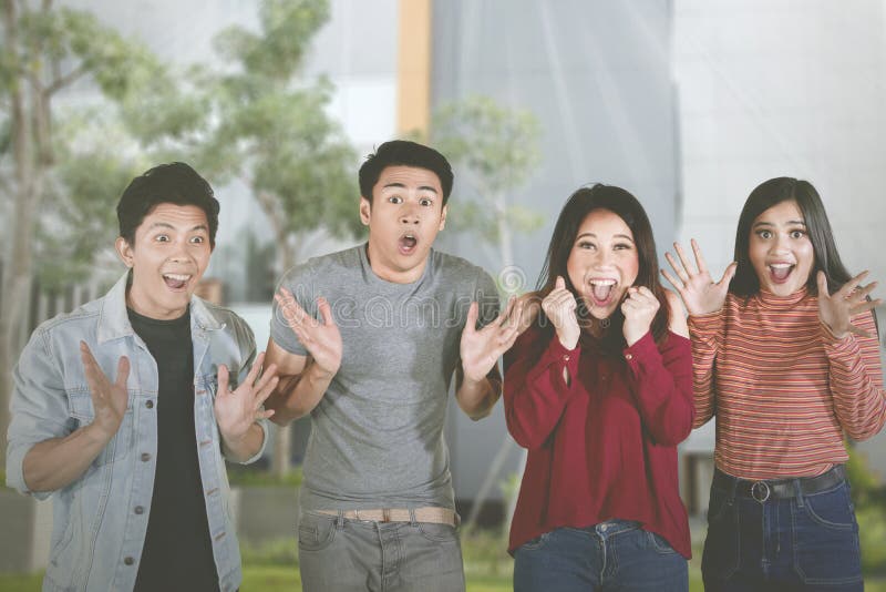 Young People Expressing Shock in the Park Stock Image - Image of face ...