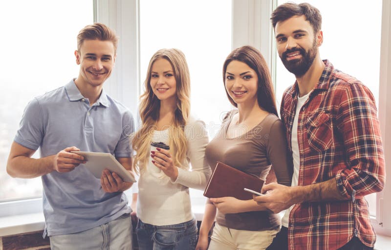Young people with gadgets stock photo. Image of partner - 82311340