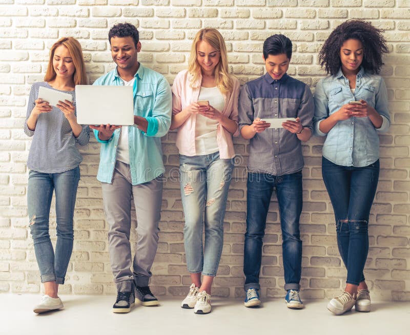 Young people with gadgets stock photo. Image of happy - 72207494