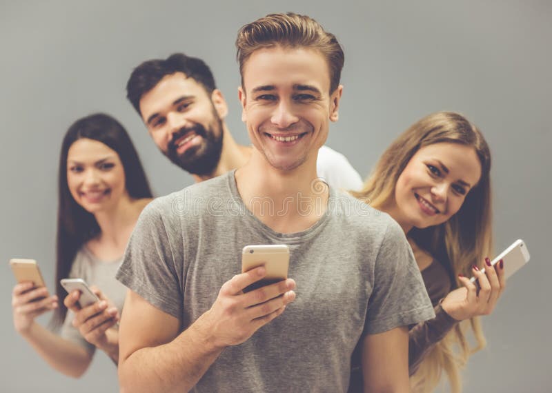 Young people with gadgets stock image. Image of friends - 82313273