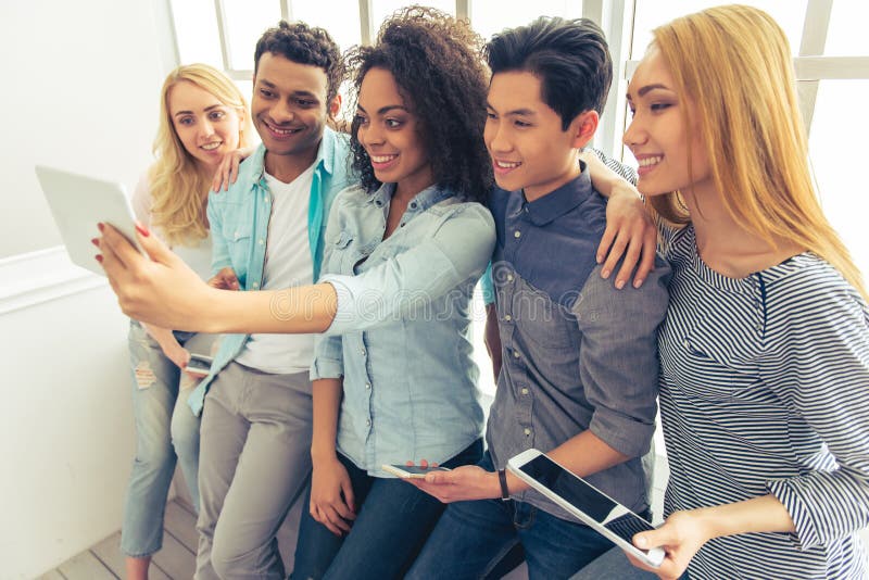 Young people with gadgets stock image. Image of chinese - 72211567