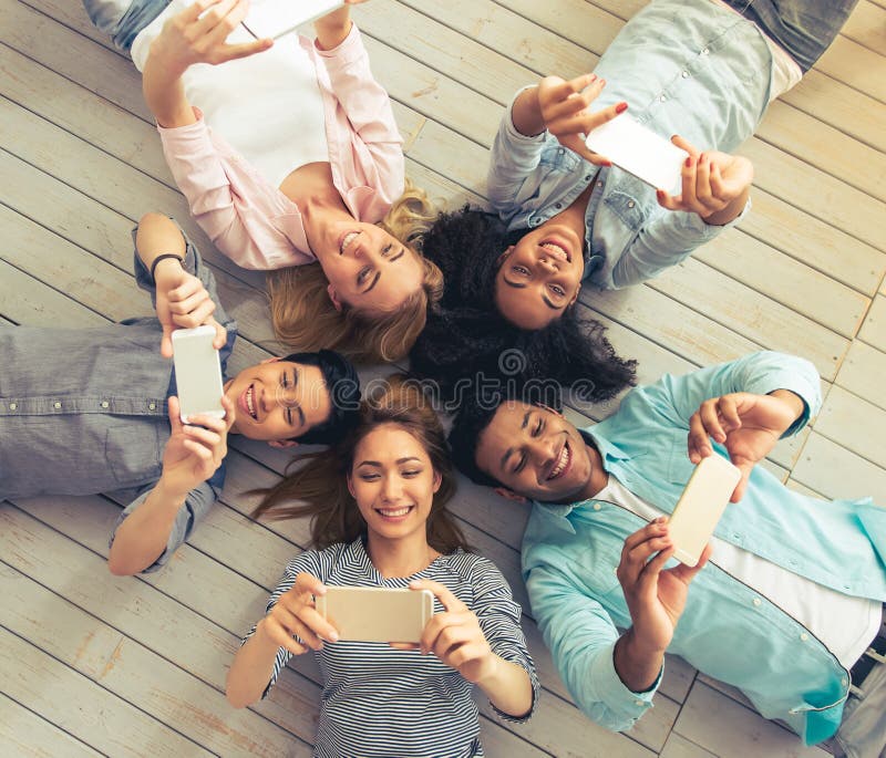 Young people with gadgets stock image. Image of group - 72211537
