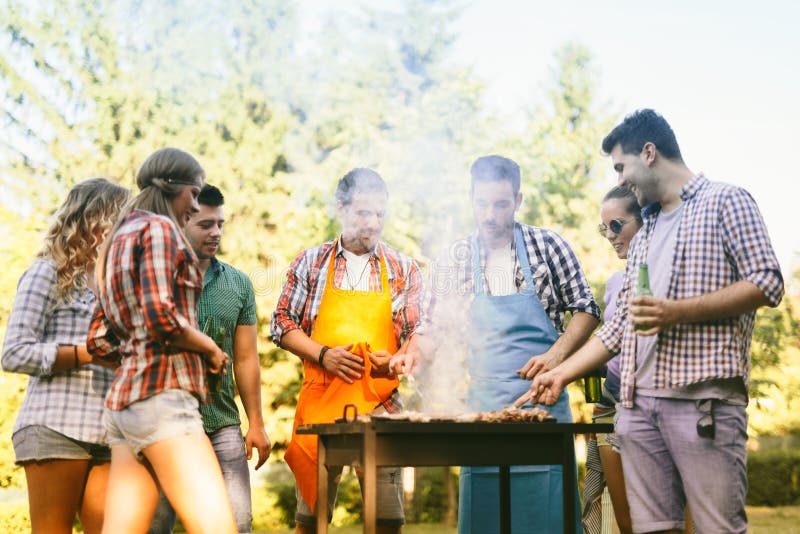 1,074 People Barbecuing Stock Photos - Free & Royalty-Free Stock Photos ...