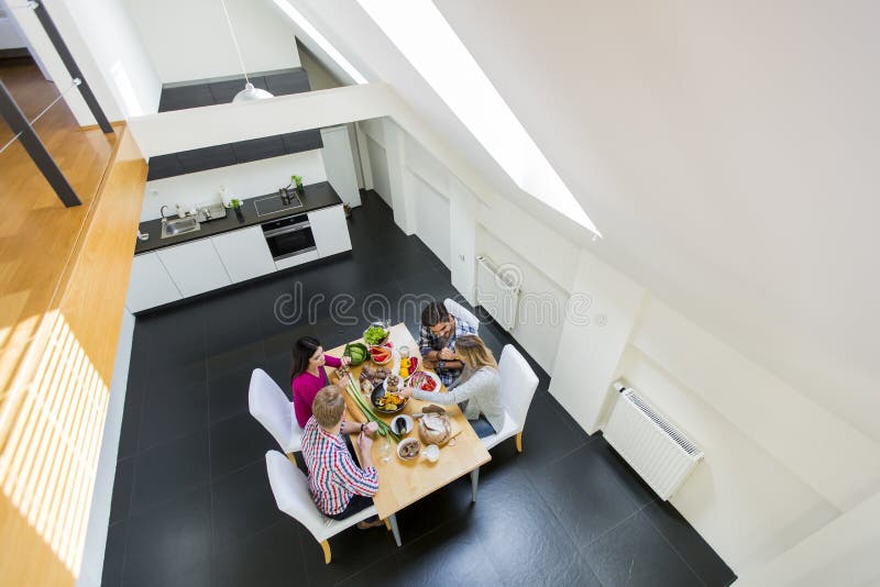 Young People Have a Dinner in Modern Kitchen Stock Image - Image of ...
