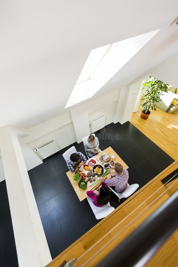Young People Have a Dinner in Modern Kitchen Stock Image - Image of ...