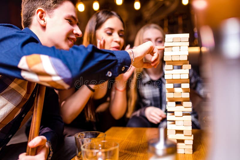 Young People Have Fun Playing Board Games at a Table Stock Photo ...