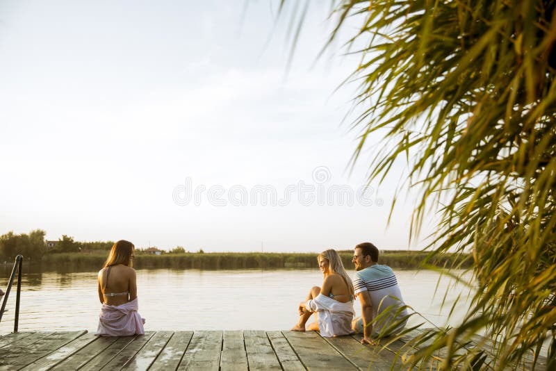 Young People Having Fun at the Lake on a Summer Day Stock Photo - Image ...