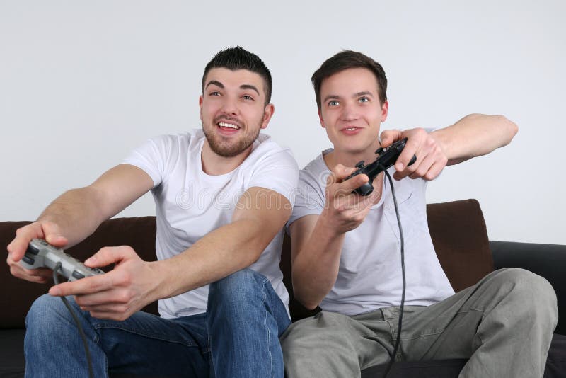 Young People Having Fun while Playing Video Games Stock Photo - Image ...