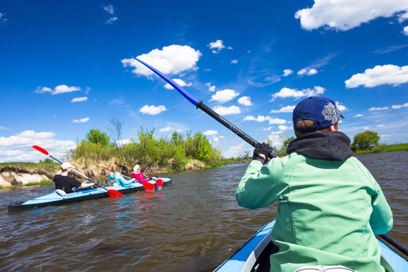 Young People are Kayaking on a River in Beautiful Nature. Summer Sunny ...