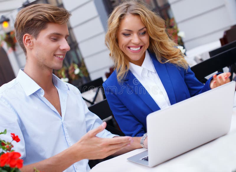 Young people with laptop stock photo. Image of handsome - 36579994