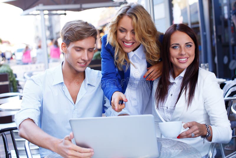 Young people with laptop stock photo. Image of businesswoman - 36554666
