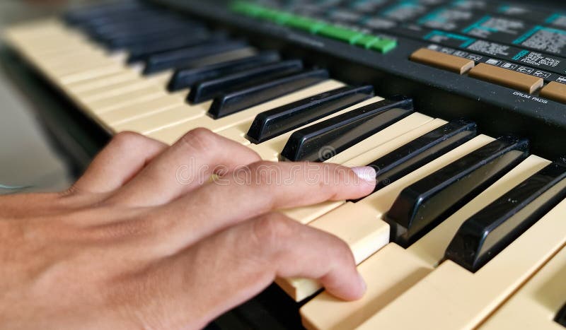 Young People Learning To Play the Keyboard Stock Photo - Image of ...