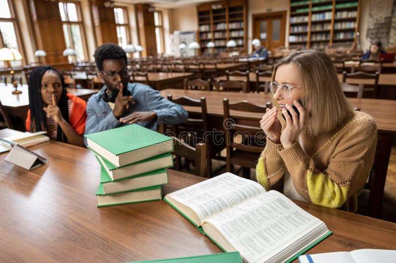 Young People in the Library, Blonde Woman Talking on the Phone Stock ...