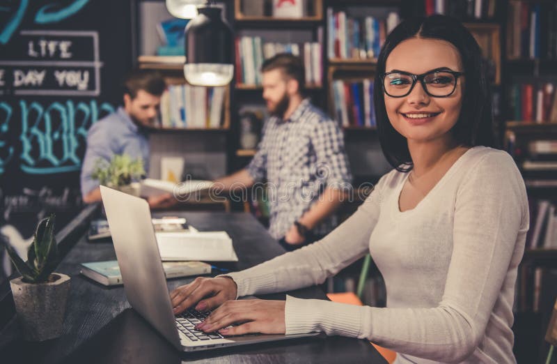 Young People in the Library Stock Photo - Image of college, bookcase ...