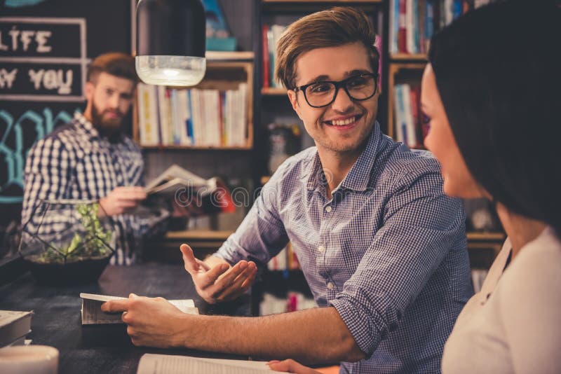 People in library aisle stock image. Image of academic - 20307361