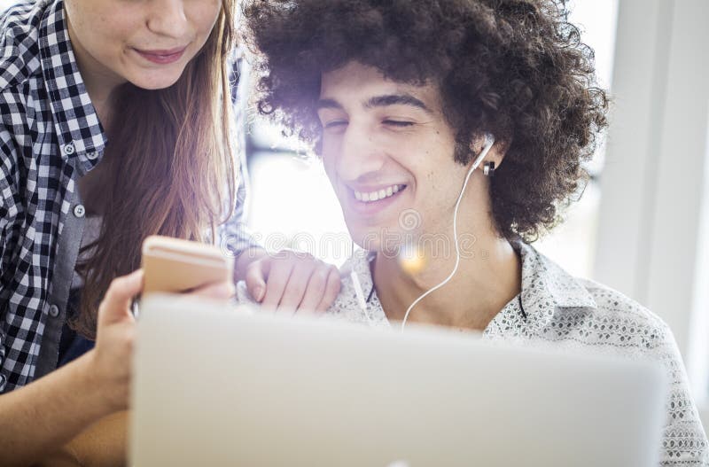 Young People Looking at Phone Stock Photo - Image of conversation ...