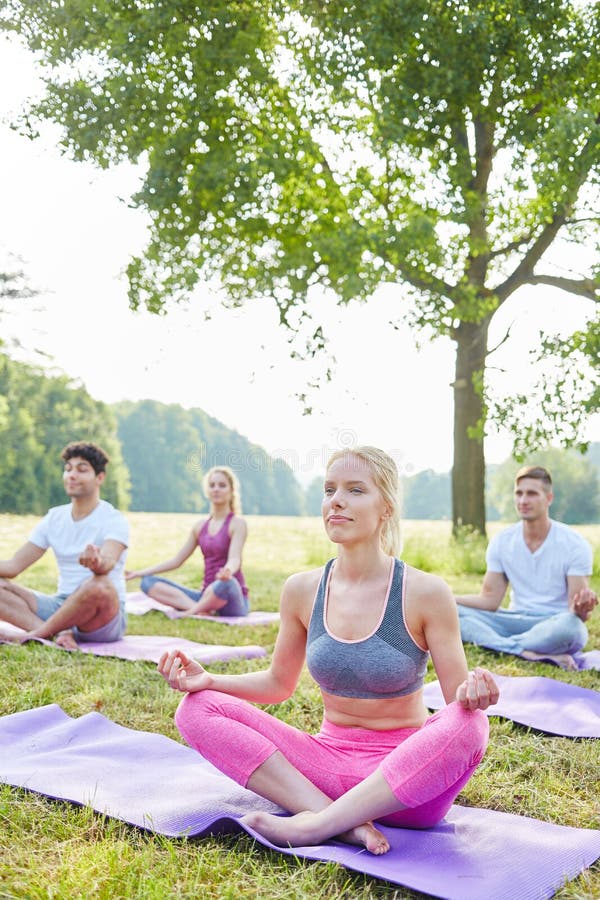 Young People Making Relaxation Exercise Stock Image - Image of ...