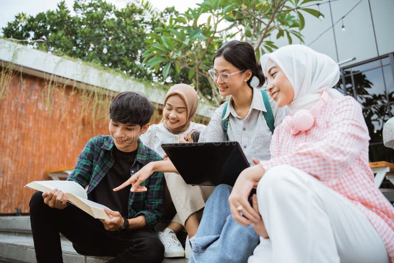 Young People Meet and Work Together Sitting on the Steps Stock Image ...