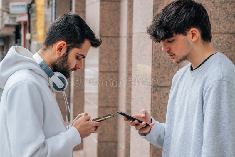 People with Mobile Phone in the Street Stock Photo - Image of diverse ...