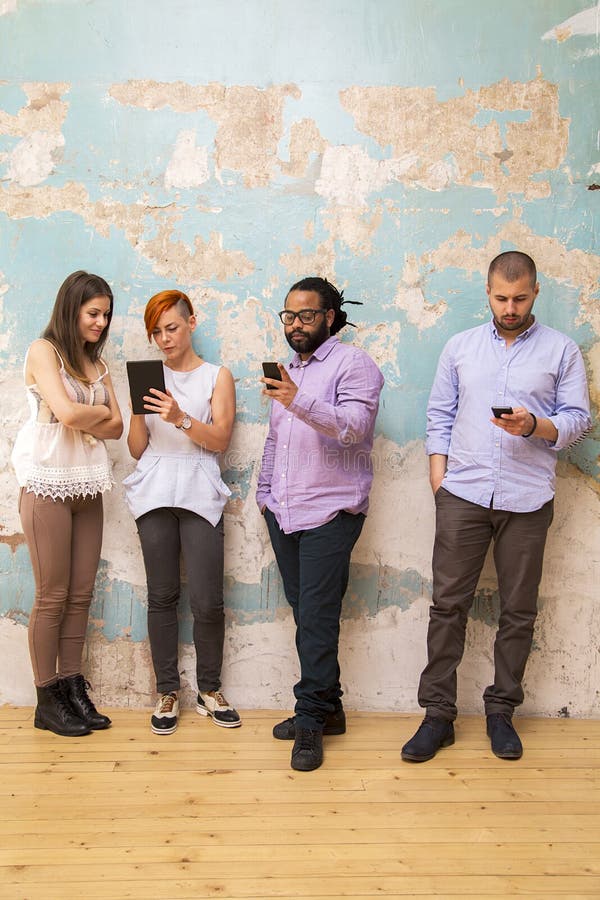 Young People With Mobile Phones In Hands Stock Photo - Image of grunge ...