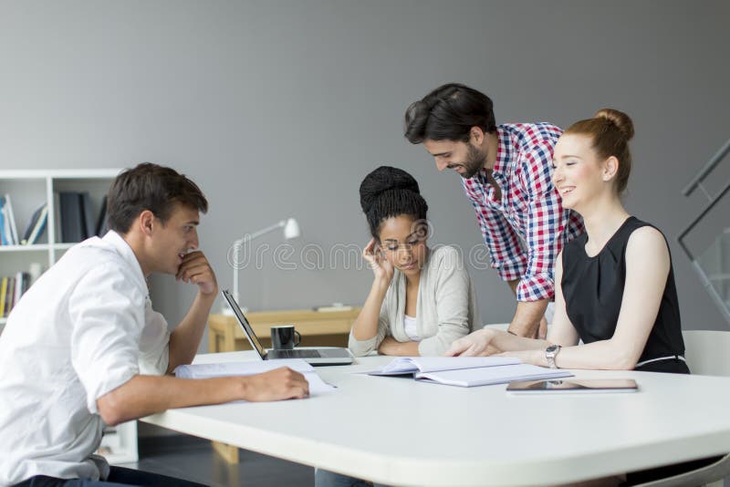 Young people in the office stock image. Image of front - 54685895