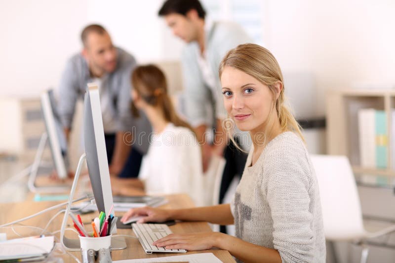 Young People At Office Working Stock Photo - Image of group, pretty ...