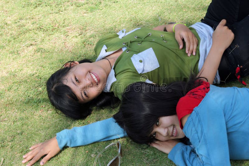 Young people outdoor stock photo. Image of grass, mobile - 9195426