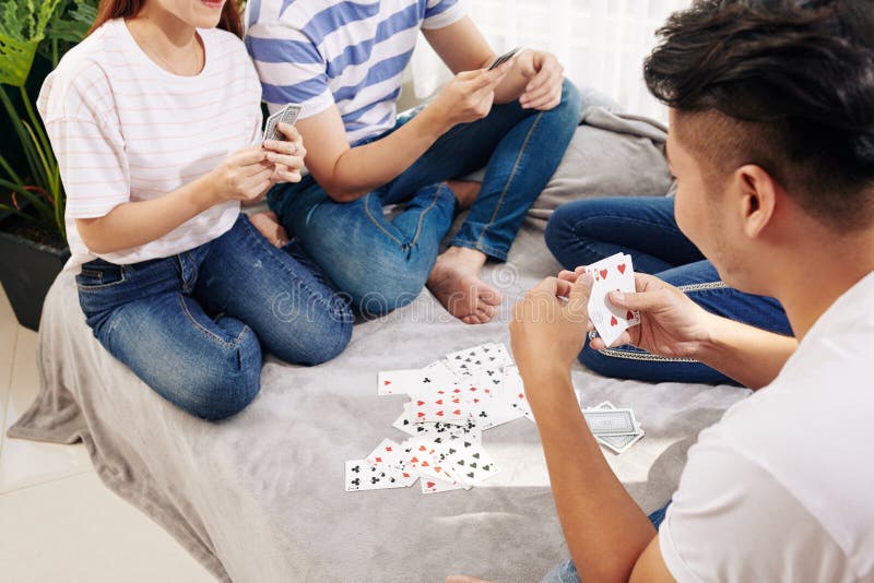 Young People Playing Card Game Stock Image - Image of cheerful, playful ...