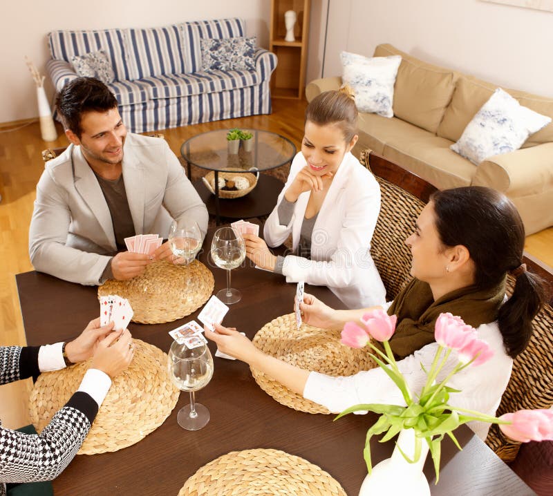 Young People Playing Cards at Home Stock Photo - Image of card ...