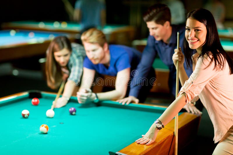 Young people playing pool stock photo. Image of adult - 53184358