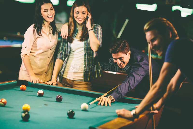 Young people playing pool stock photo. Image of beautiful - 60788148