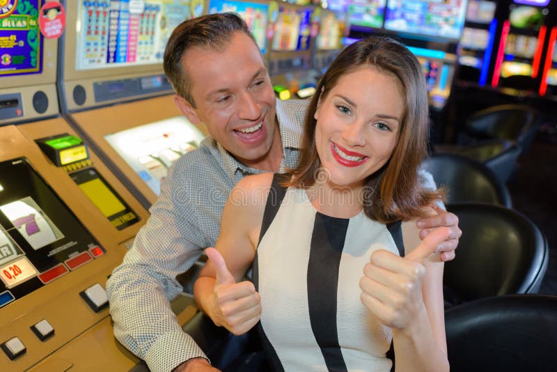 Win Slot Machine Group Young People Machines Stock Photos - Free ...