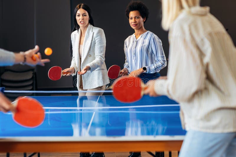 People Playing Table Tennis in the Office at Work Stock Image - Image ...